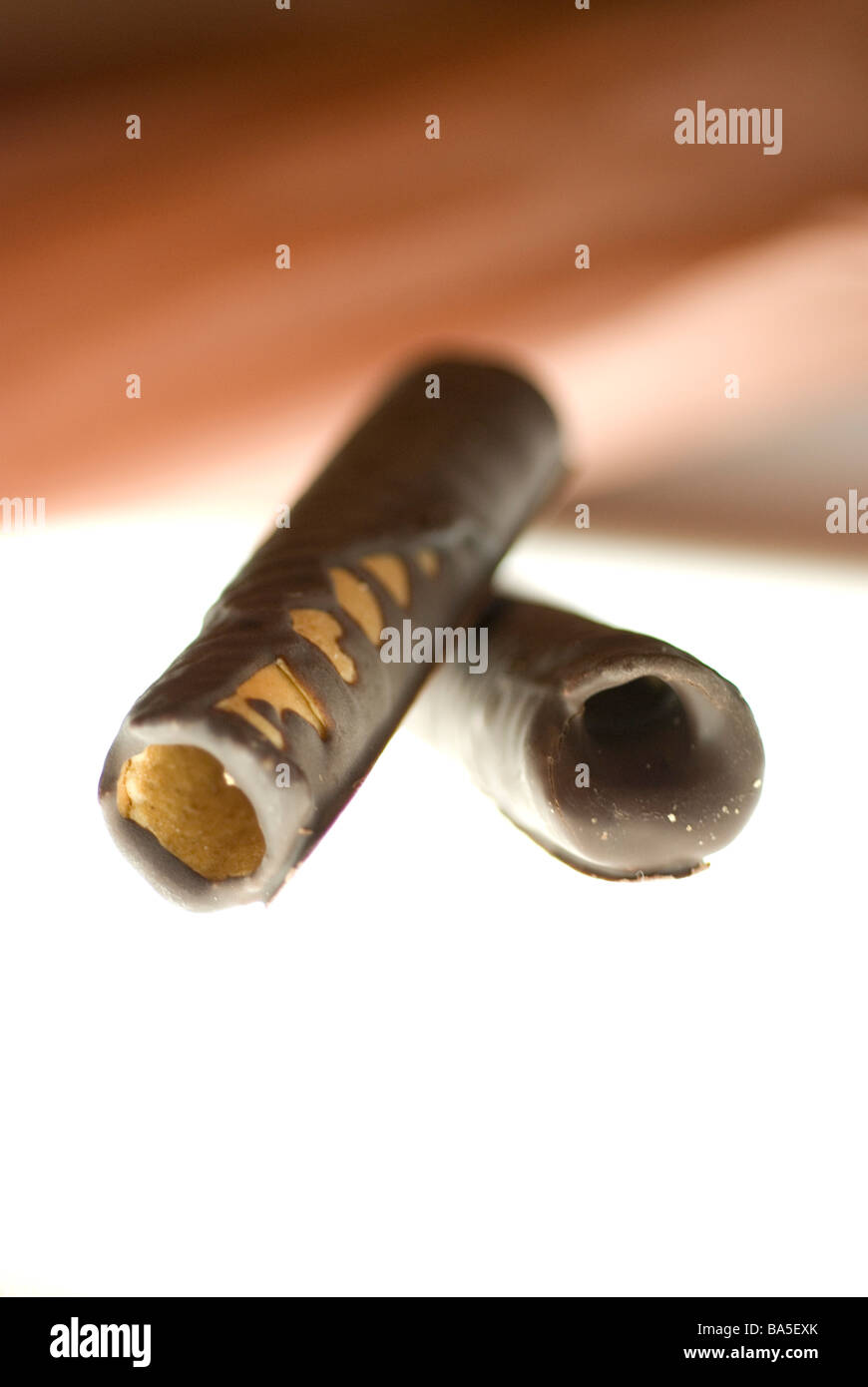 two chocolate stick biscuits Stock Photo - Alamy