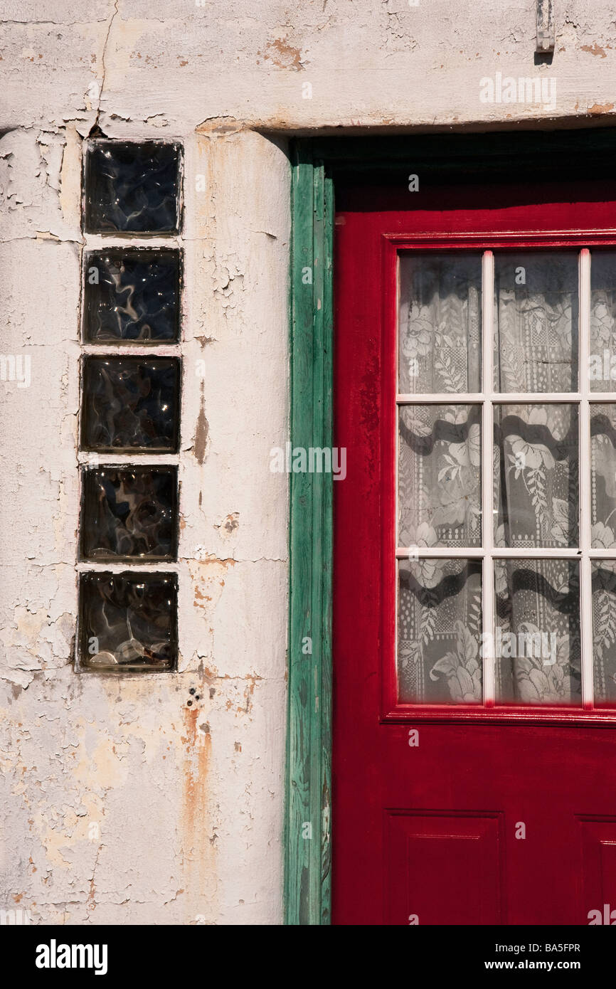 Colorful front of abandoned building Stock Photo - Alamy
