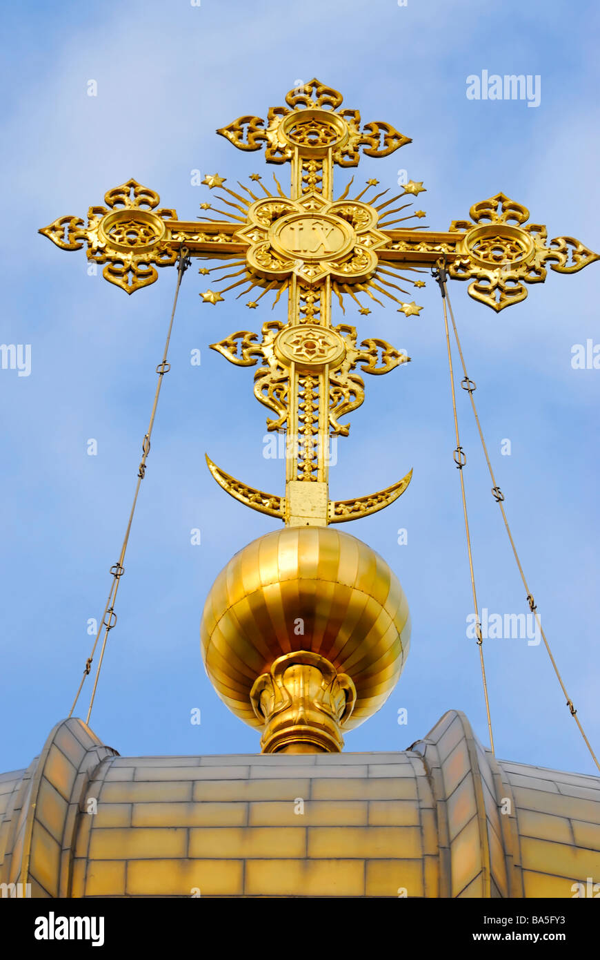 Golden cross on top church hi-res stock photography and images - Alamy