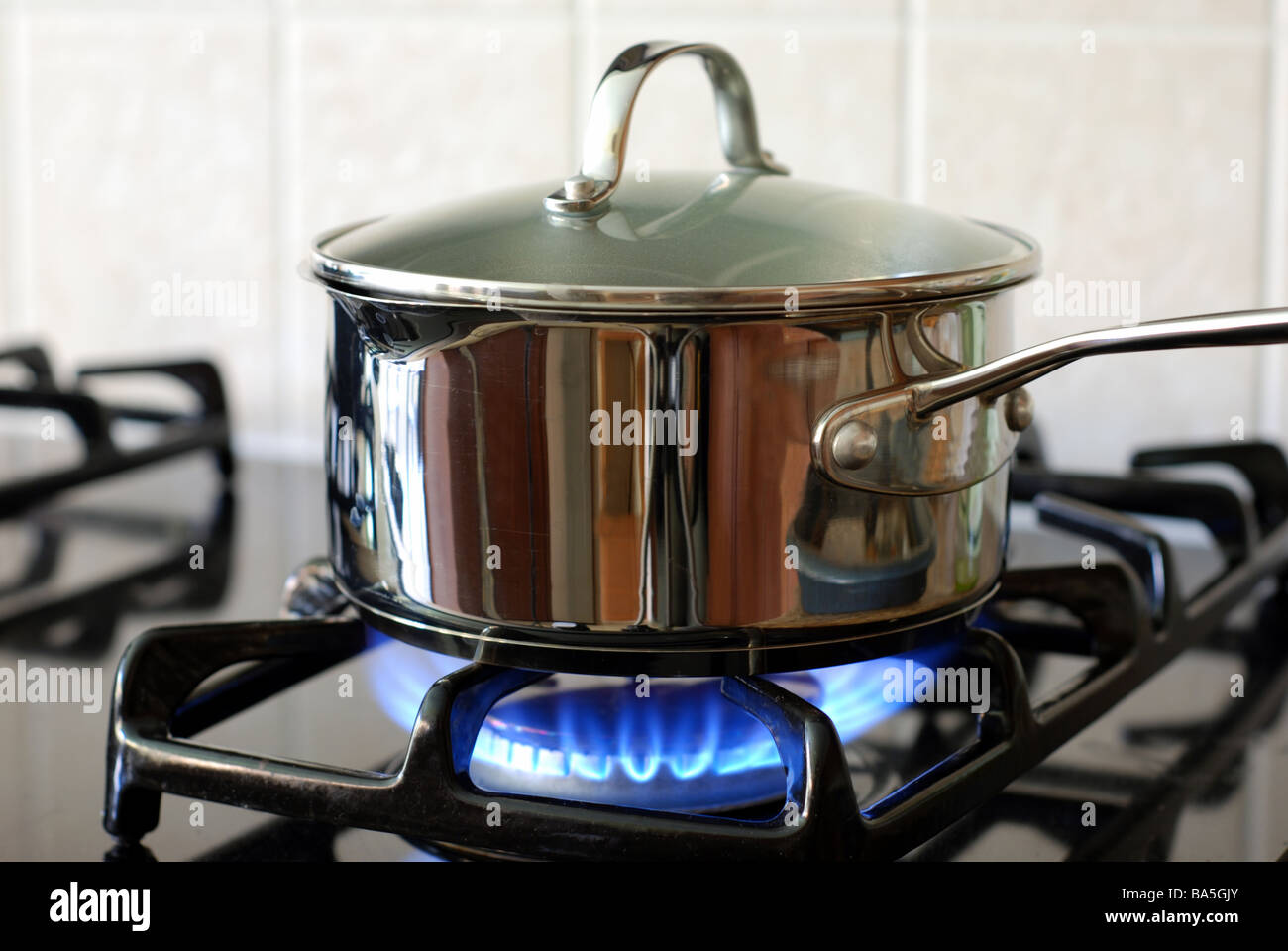 Pot on the gas stove Stock Photo - Alamy