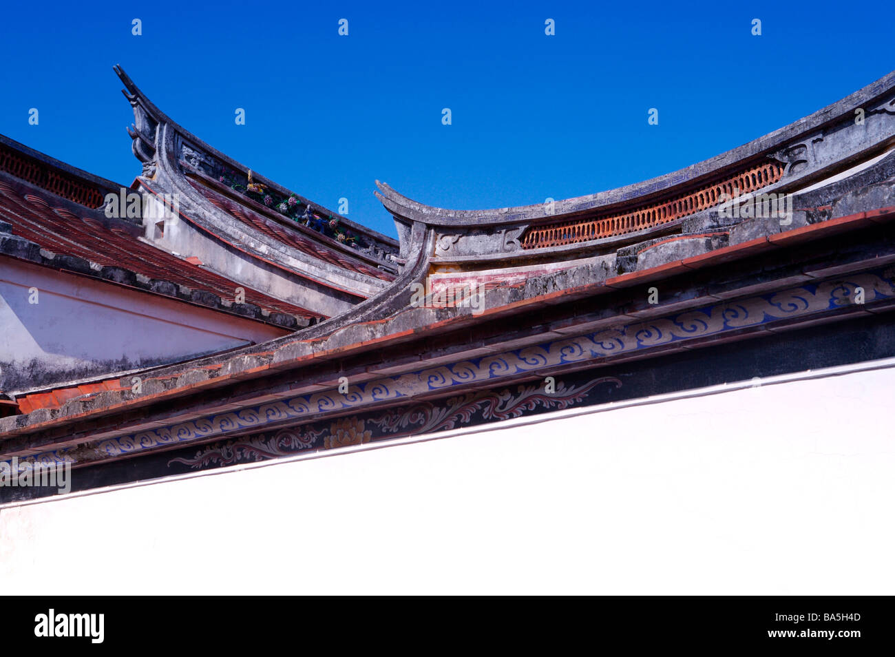 Roofs of Chinese architecture against blue sky Stock Photo - Alamy