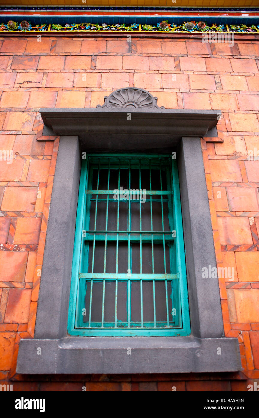 Window in brick wall view from below Stock Photo - Alamy