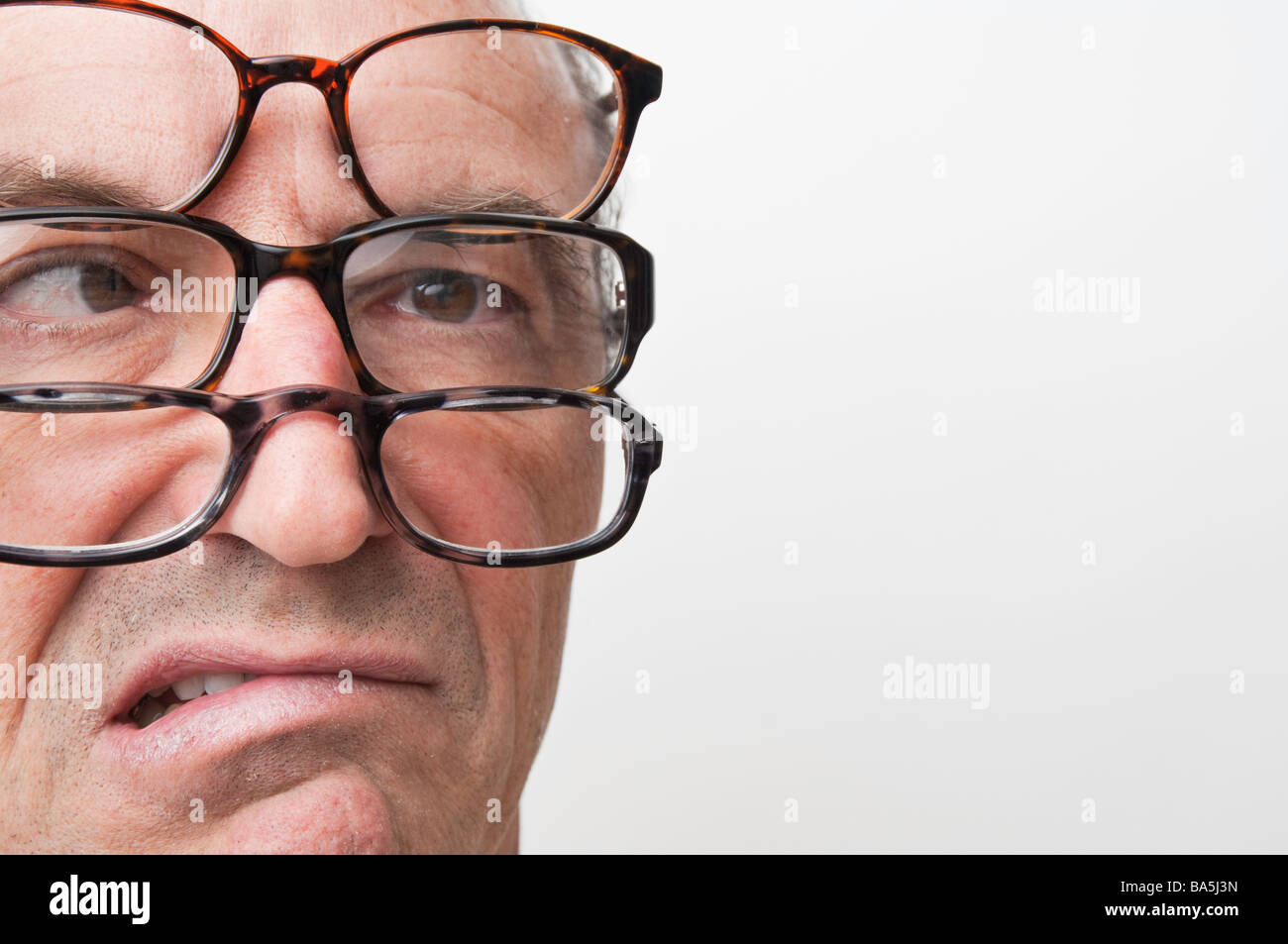 Three wearing three pairs glasses hi-res stock photography and images ...