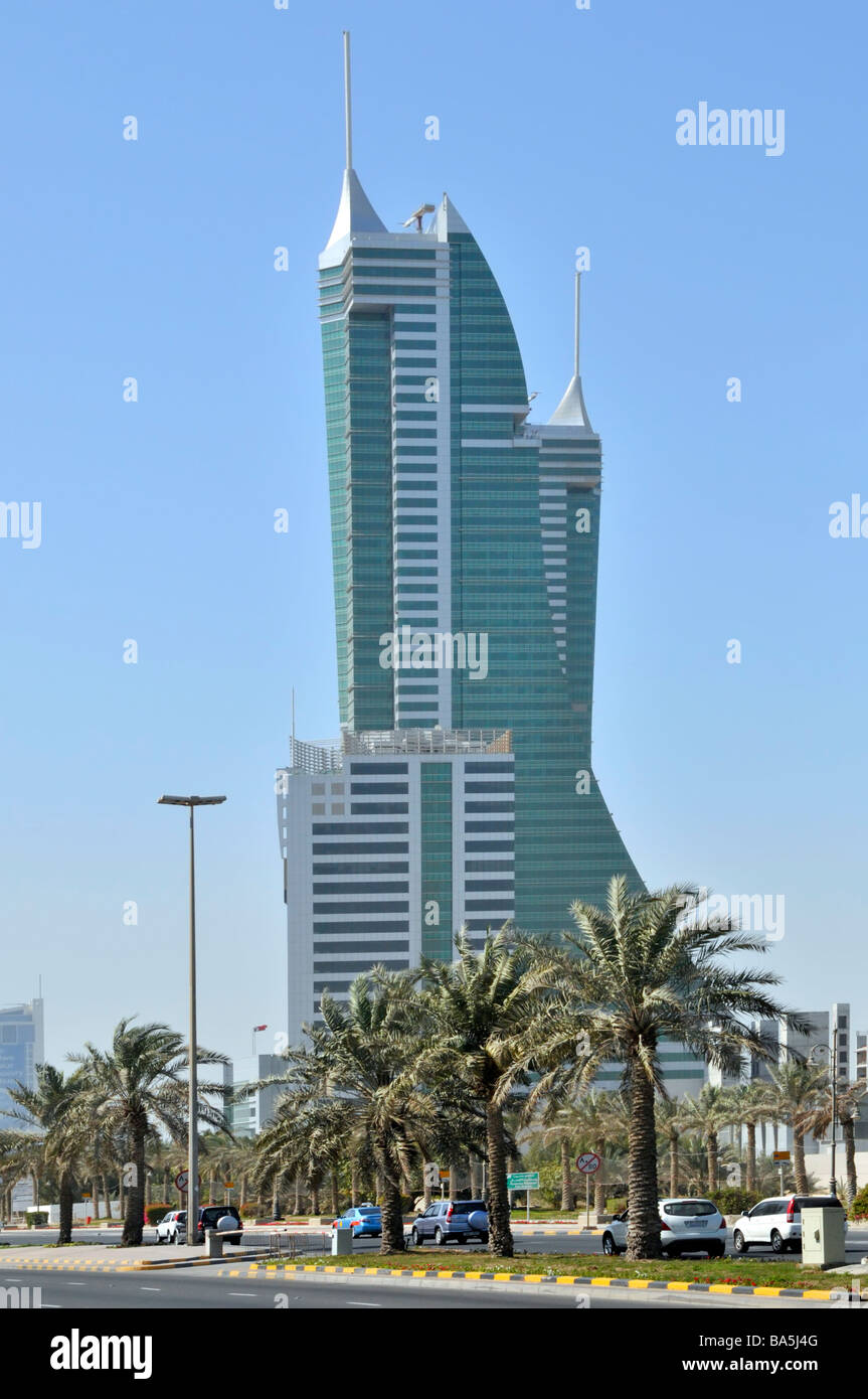 Manama Bahrain typical modern building architecture with avenue of Palm ...