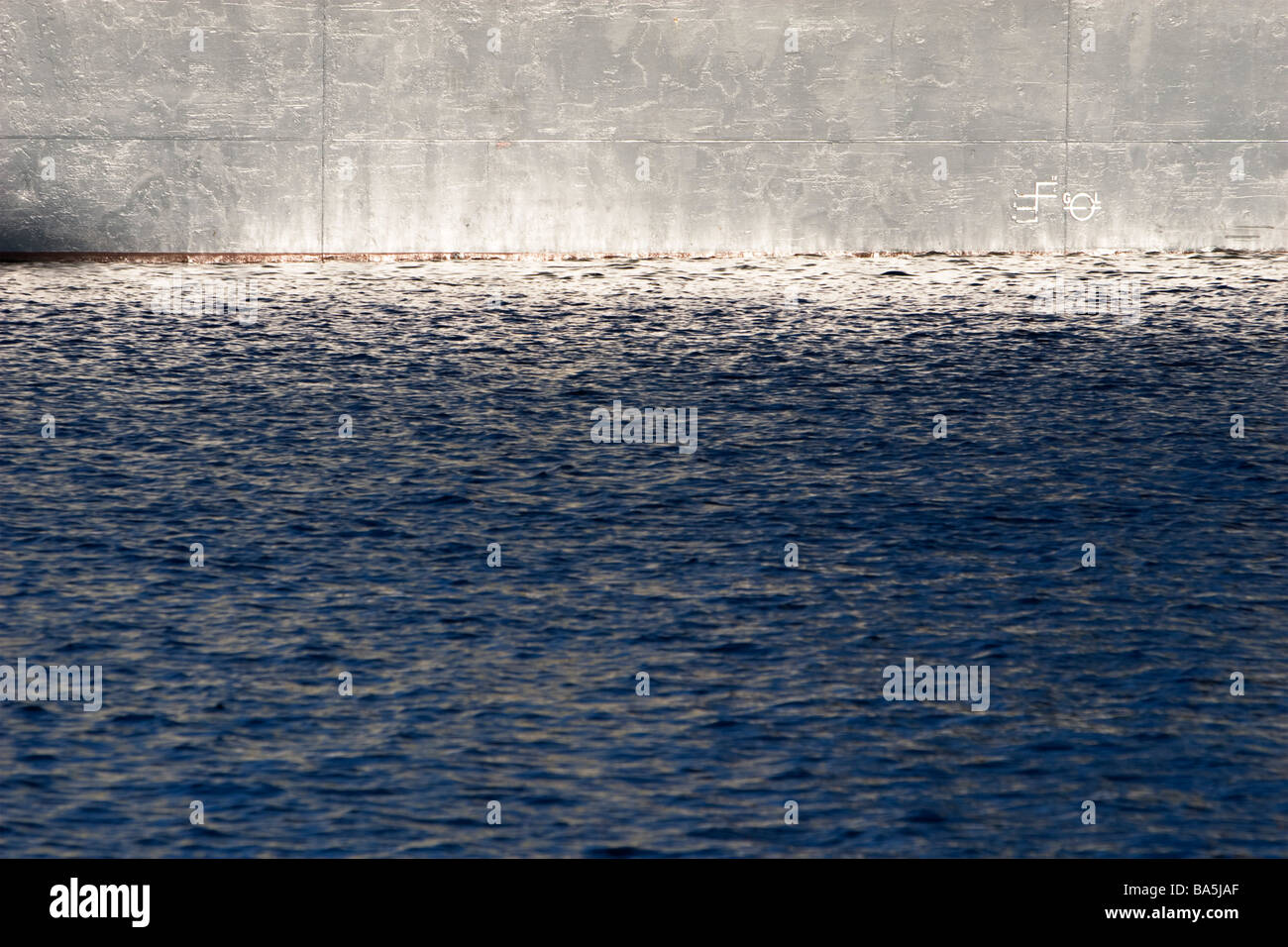 View of harbour quay wall Stock Photo - Alamy