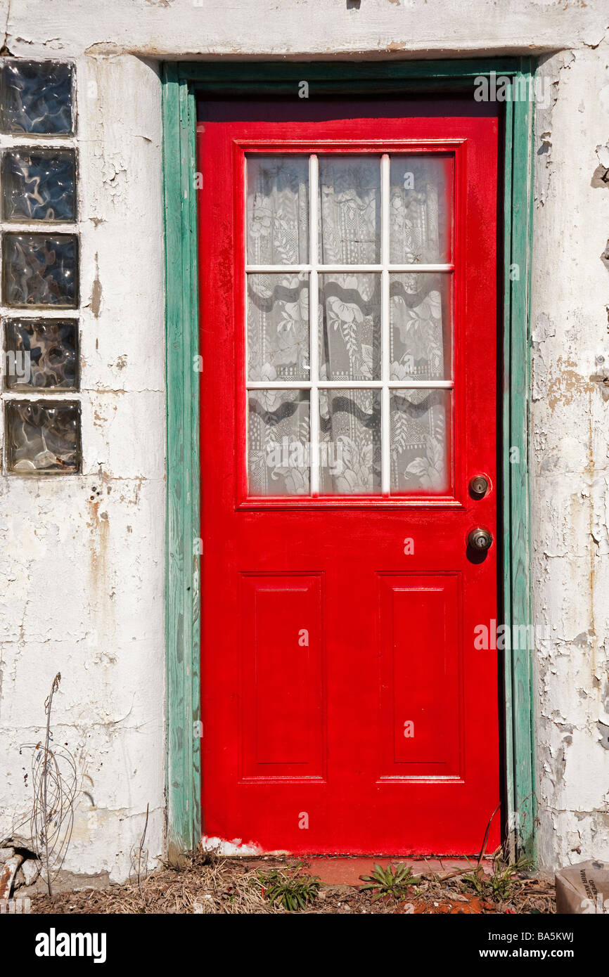 Colorful front of abandoned building Stock Photo - Alamy