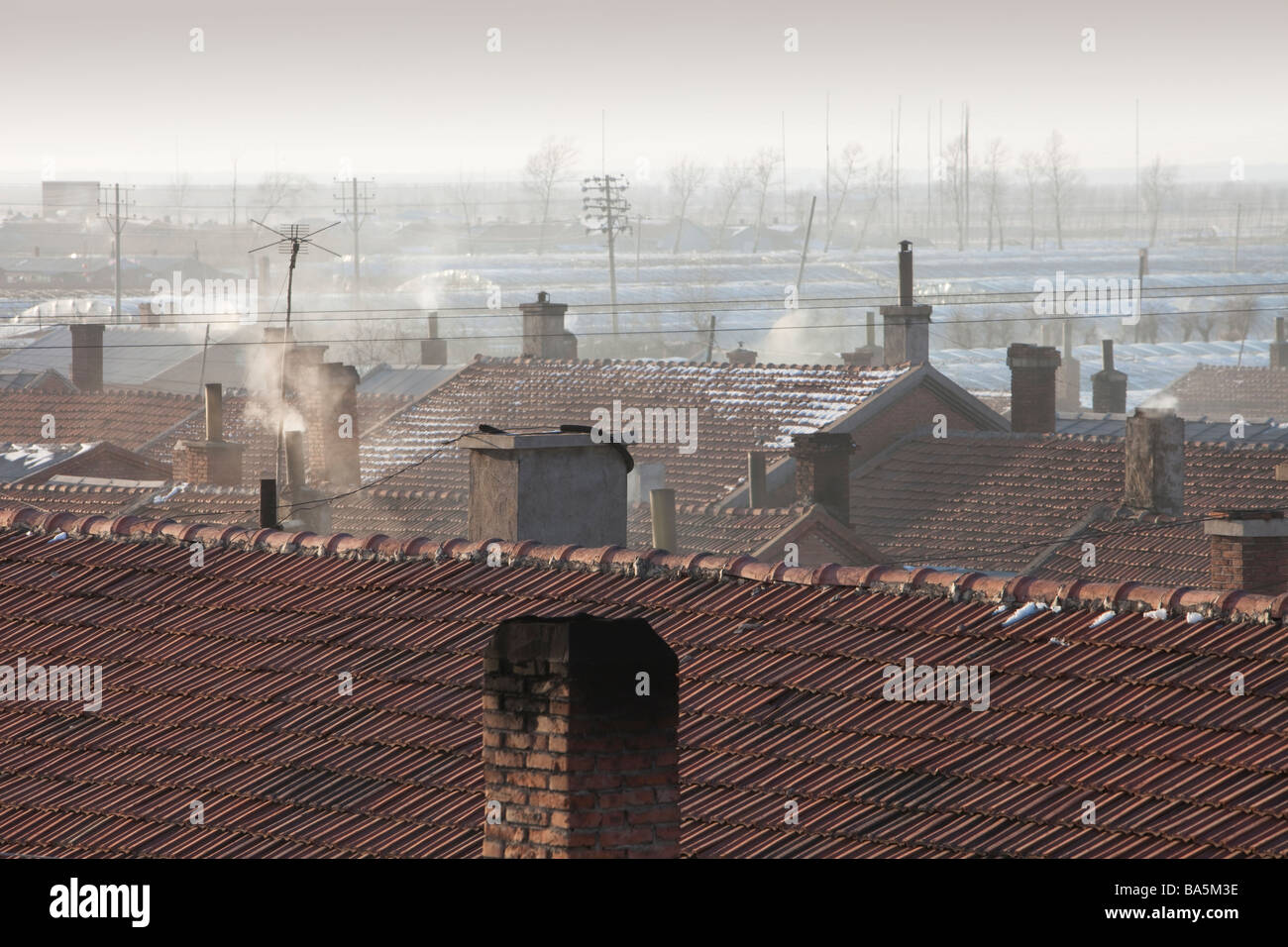 Awful air pollution from coal fires and vehicles hangs over slums in ...