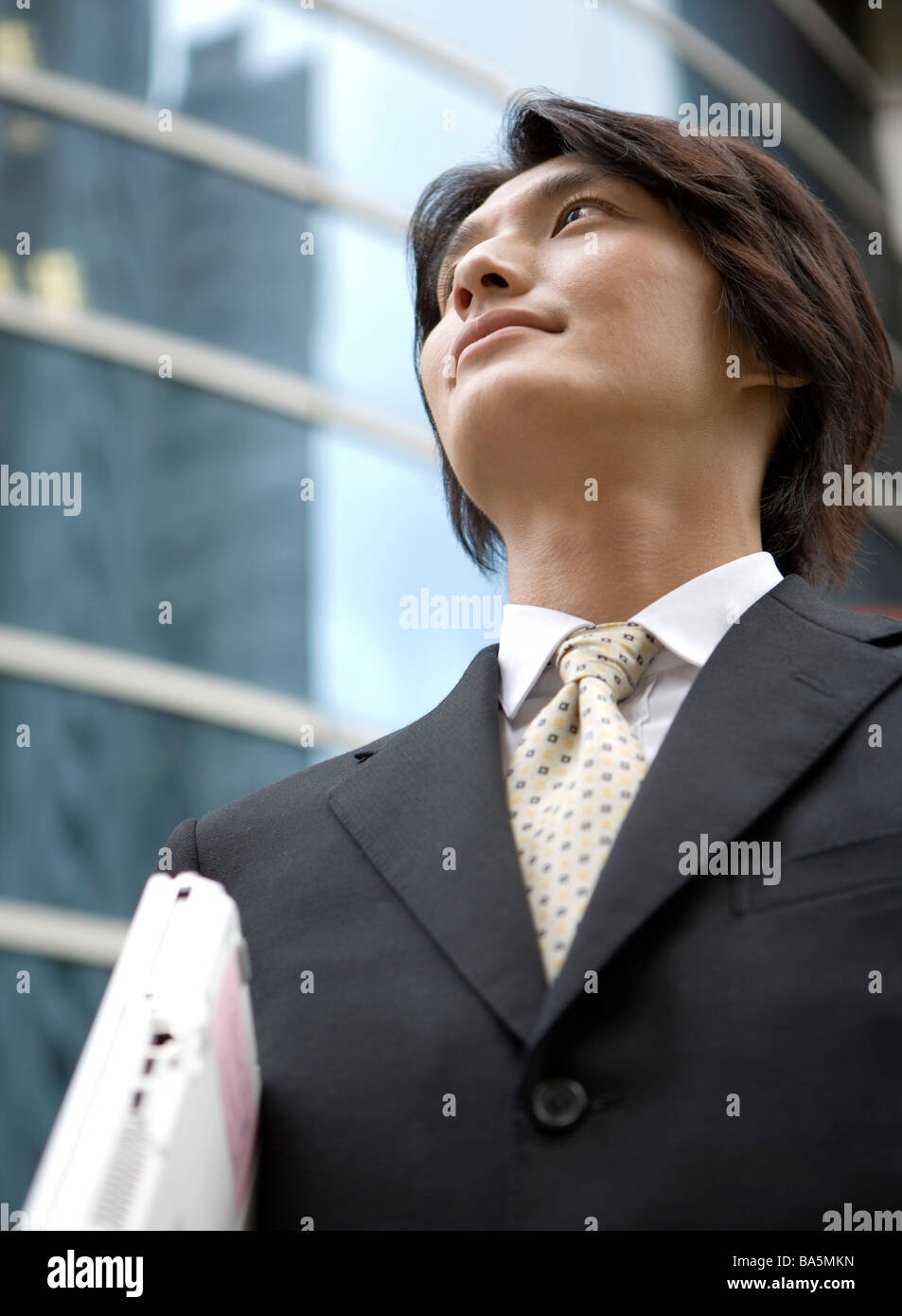 Portrait of businessman low angle view Stock Photo - Alamy