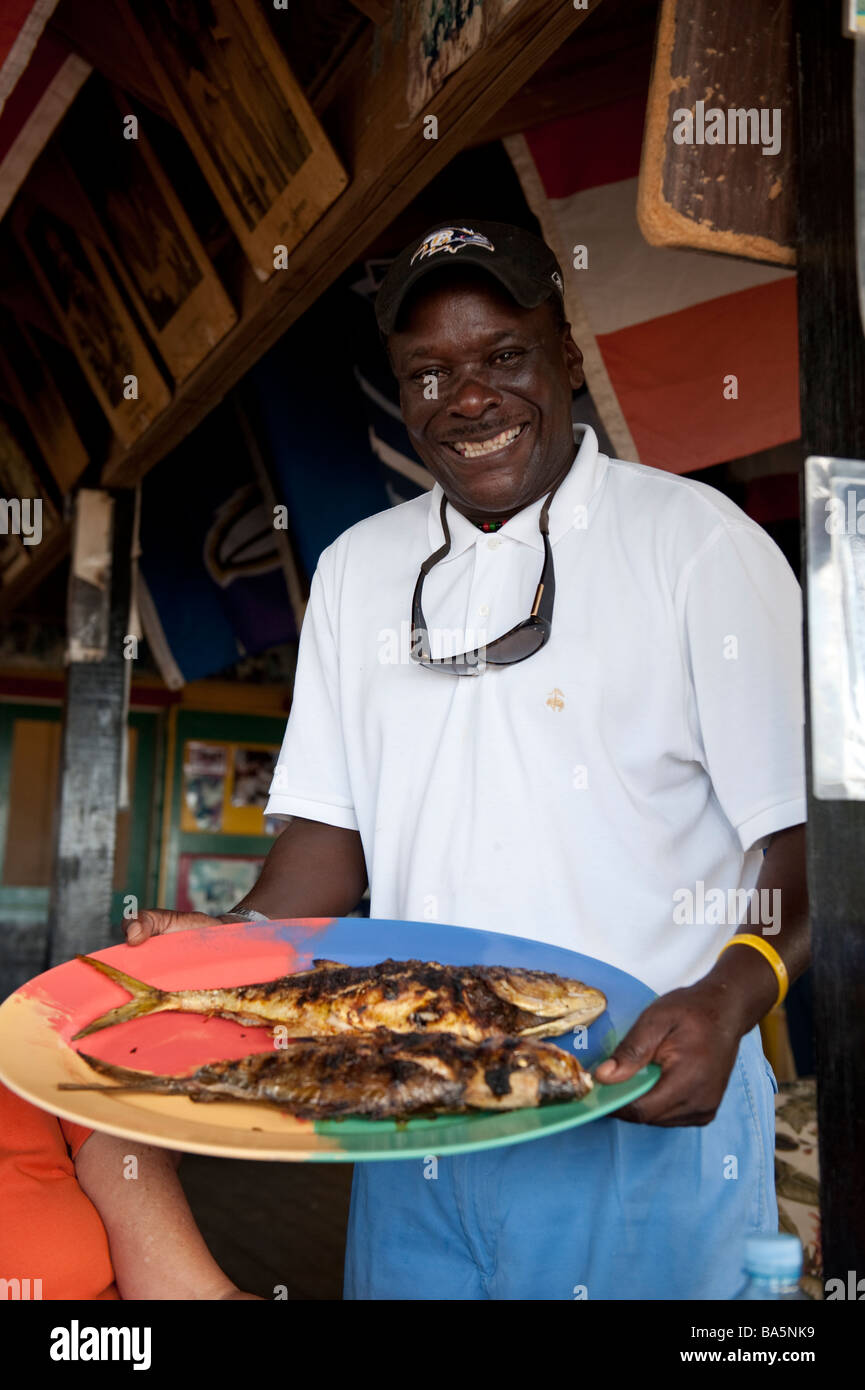 "Sunny" Sunshine with amberjack fish he has cooked at Sunshine s Beach ...