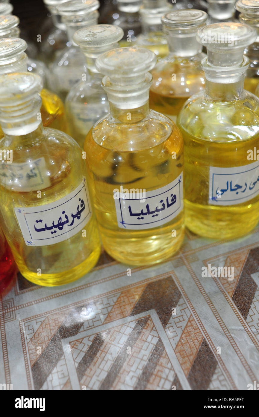 Egypt Aswan Bottles of scents and oils for making perfume line the ...
