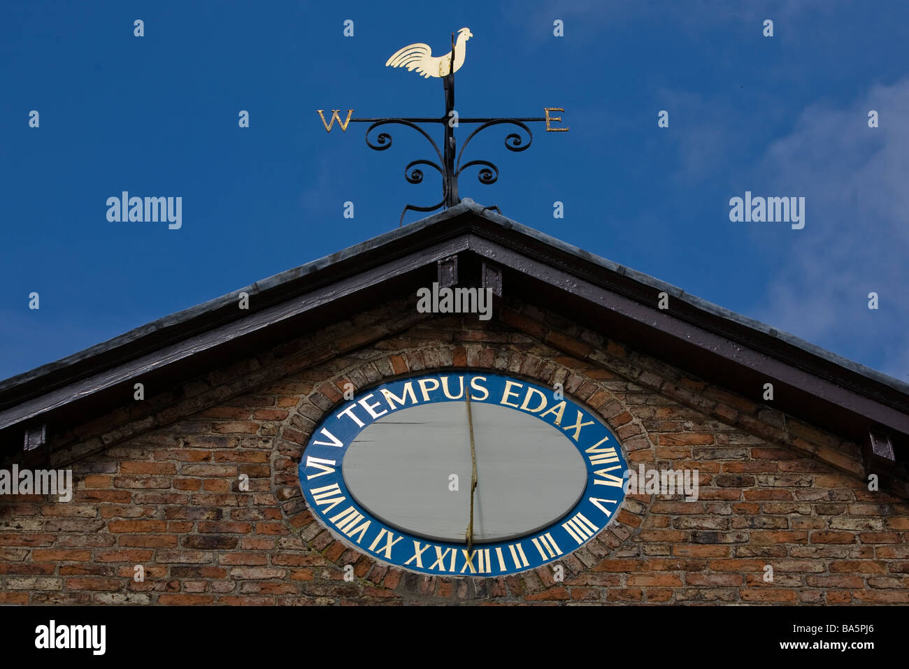 Clock Face & Weathervane Stock Photo - Alamy