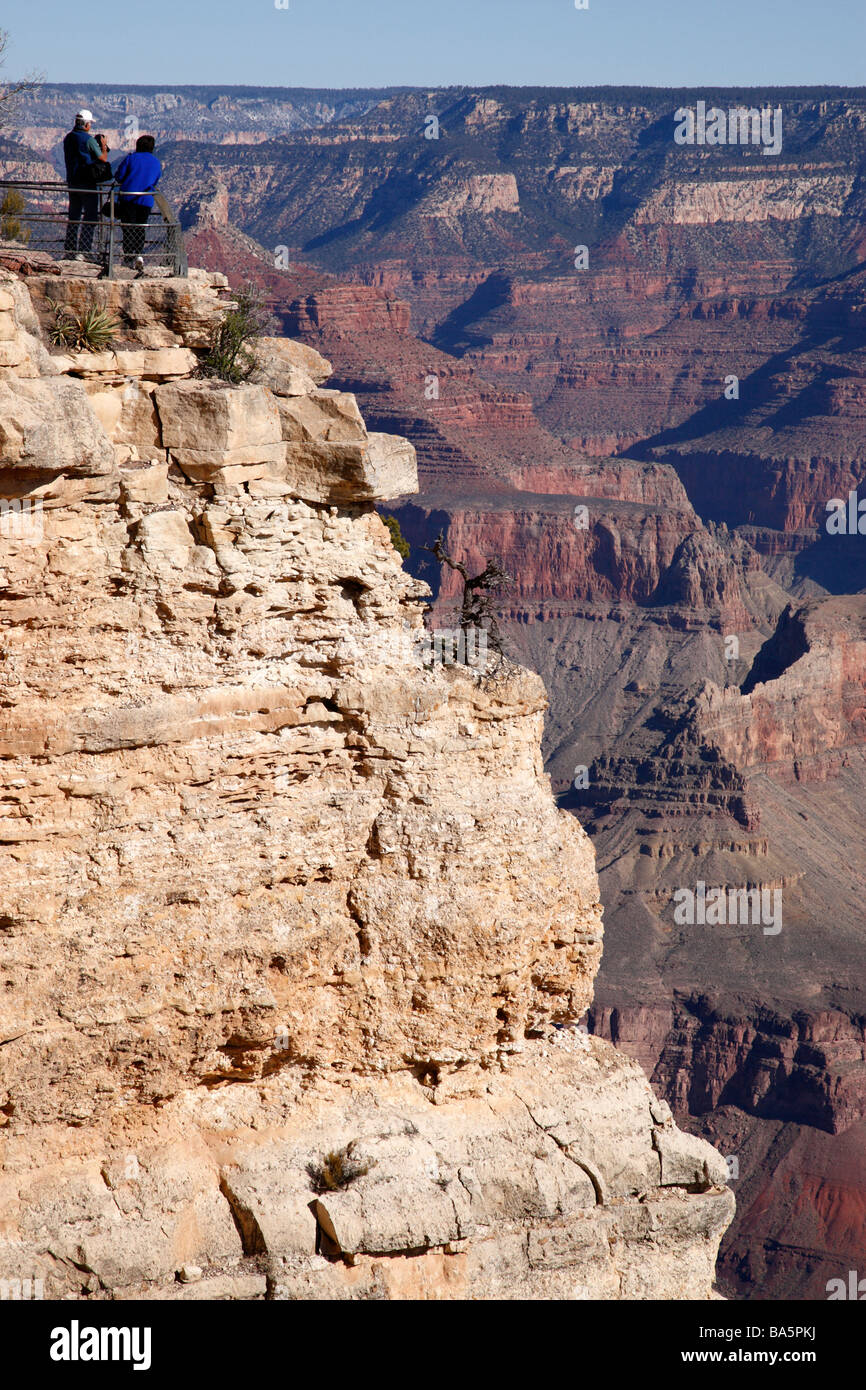 tourists enjoying the view from yavapai point a popular viewing point ...