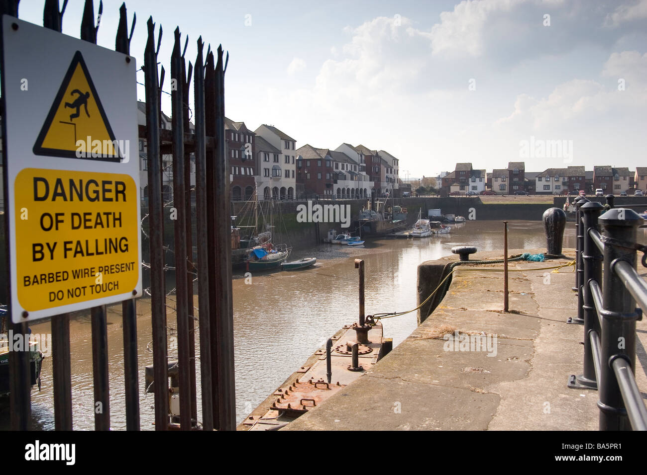 warning sign at bridge in maryport harbour Stock Photo - Alamy