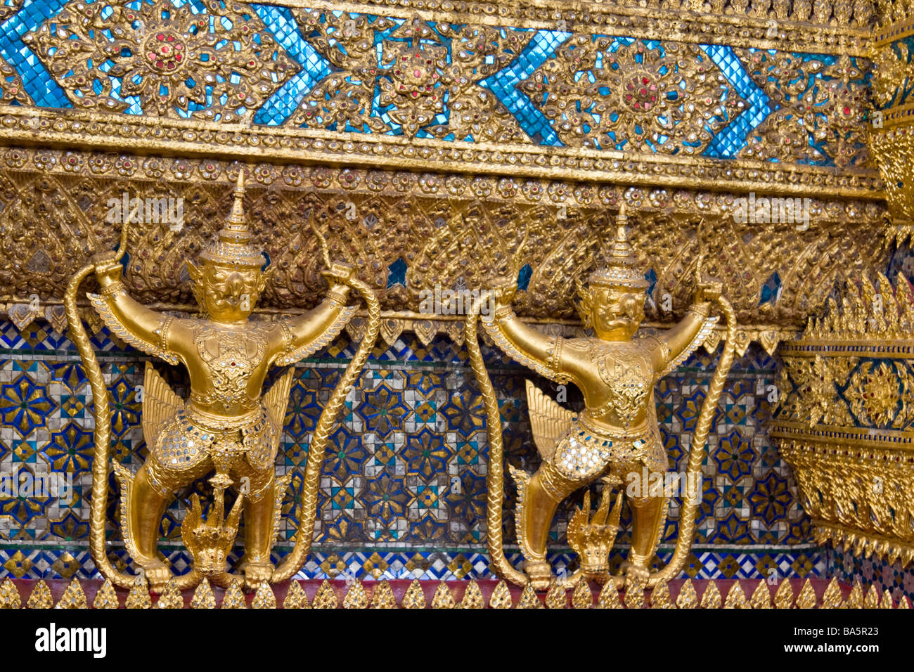Two Golden Garuda Figures with beak of eagle at Wat Phra Kaeo Bangkok ...