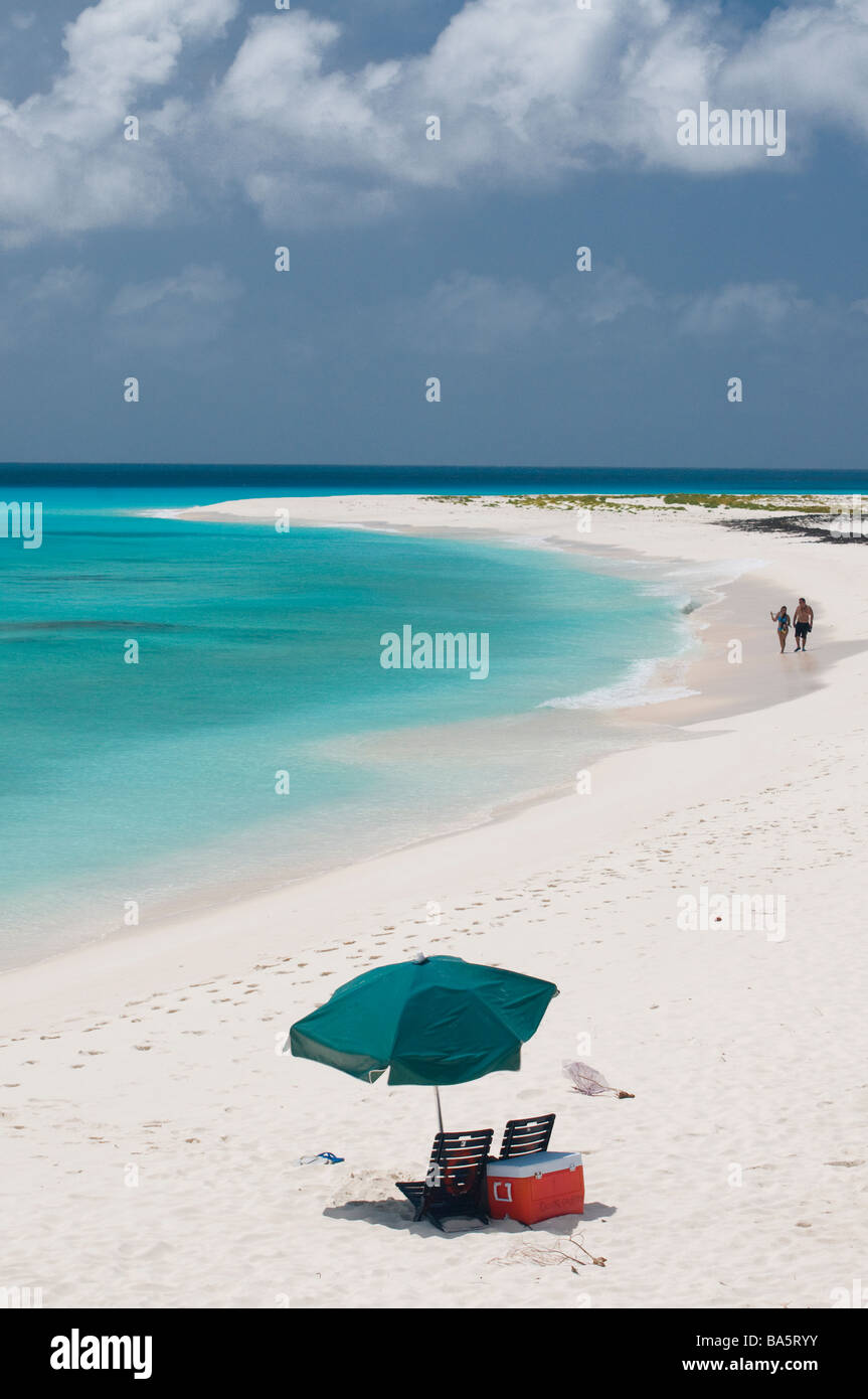 couple walking Cayo De Agua island beach Los Roques Venezuela South ...