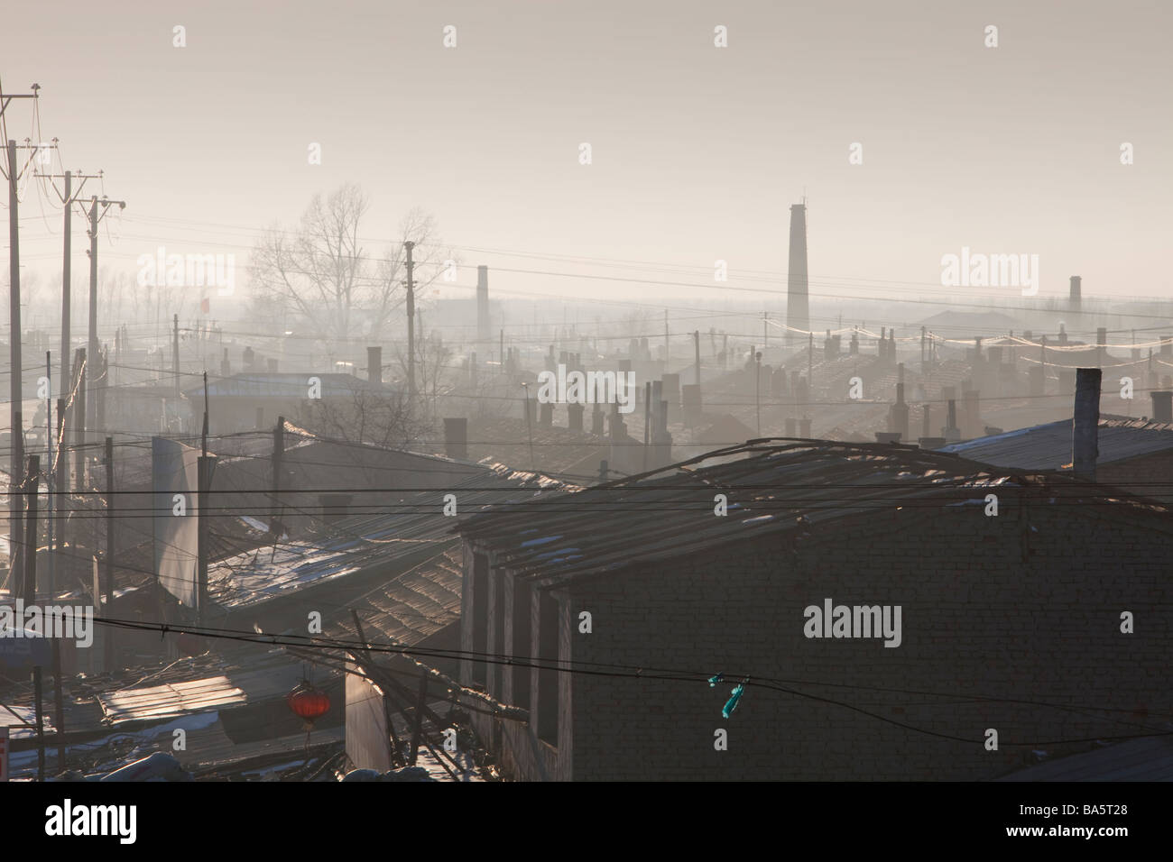 Awful air pollution from coal fires and vehicles hangs over slums in ...