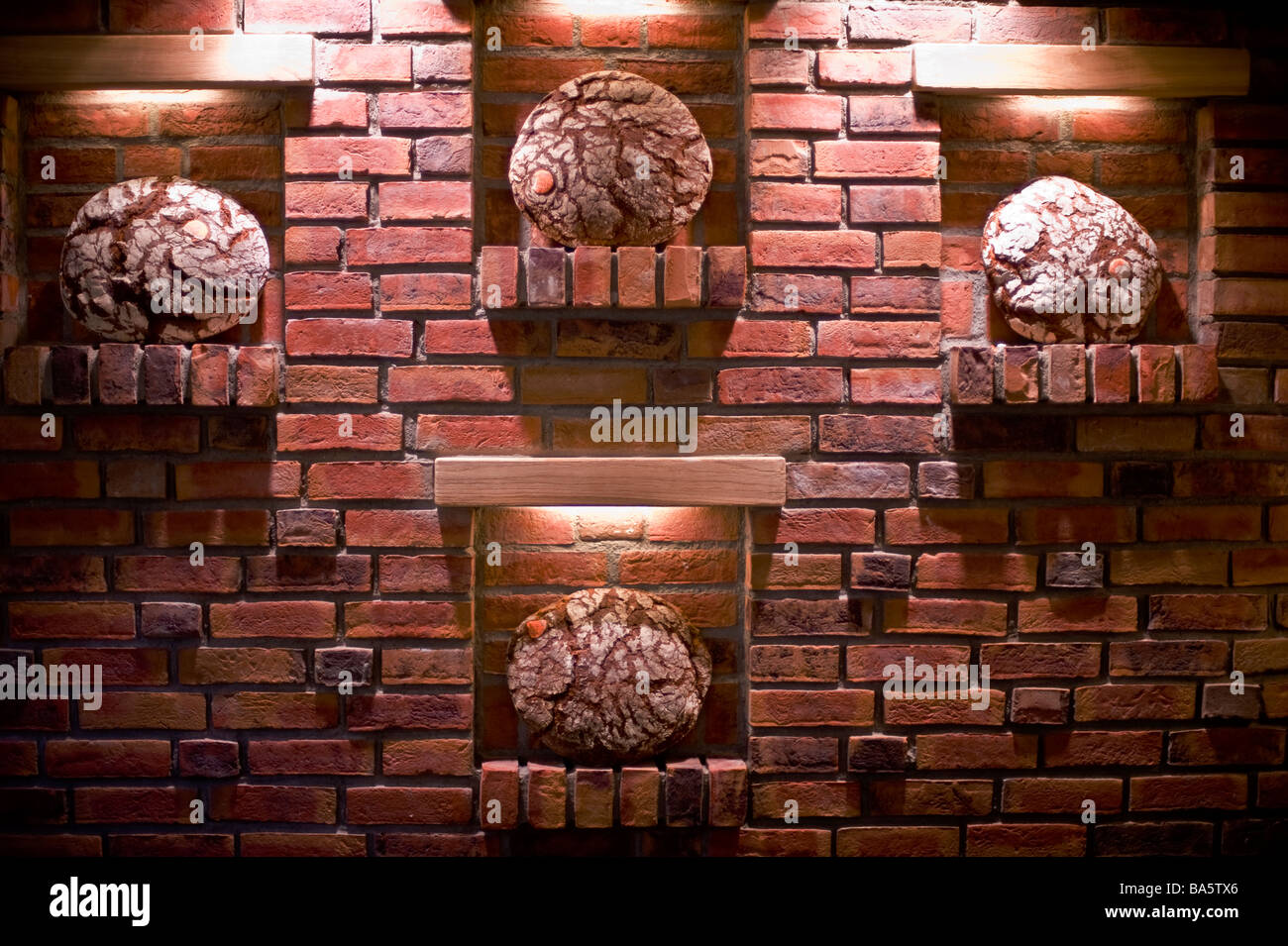 brick wall and bread loaves Stock Photo - Alamy