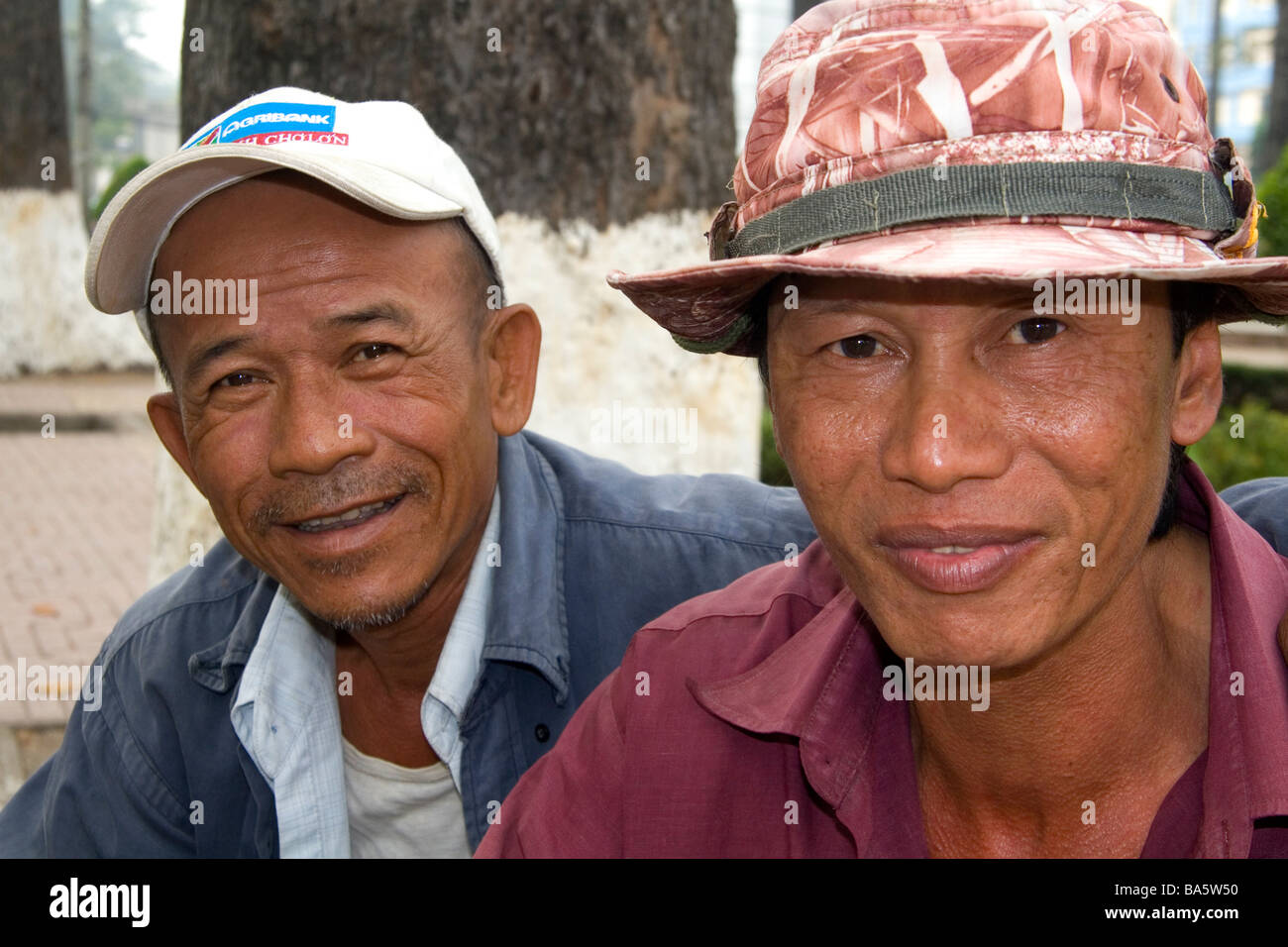 Vietnamese men in Ho Chi Minh City Vietnam Stock Photo - Alamy
