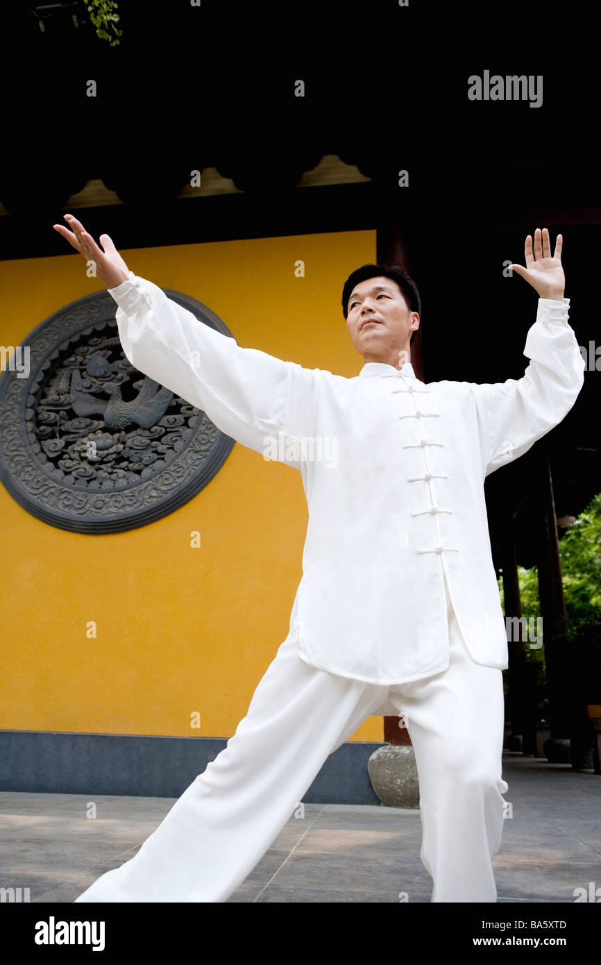 Man doing Tai Chi in Longhua temple Stock Photo - Alamy