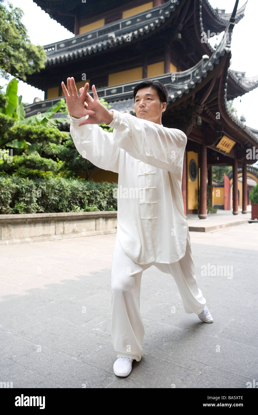 Man doing Tai Chi in Longhua temple Stock Photo - Alamy