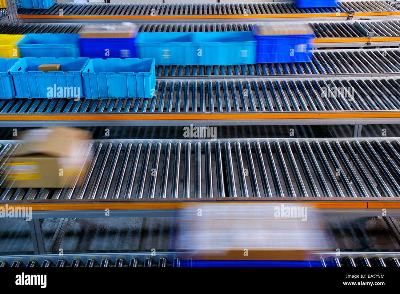 Boxes on conveyor belt Stock Photo - Alamy