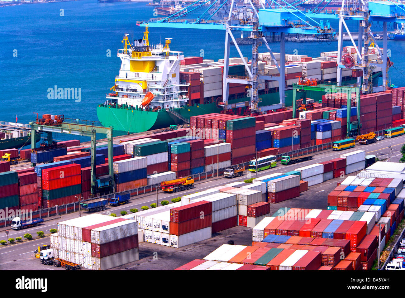 Cargo ship and cargo containers in harbor Stock Photo - Alamy