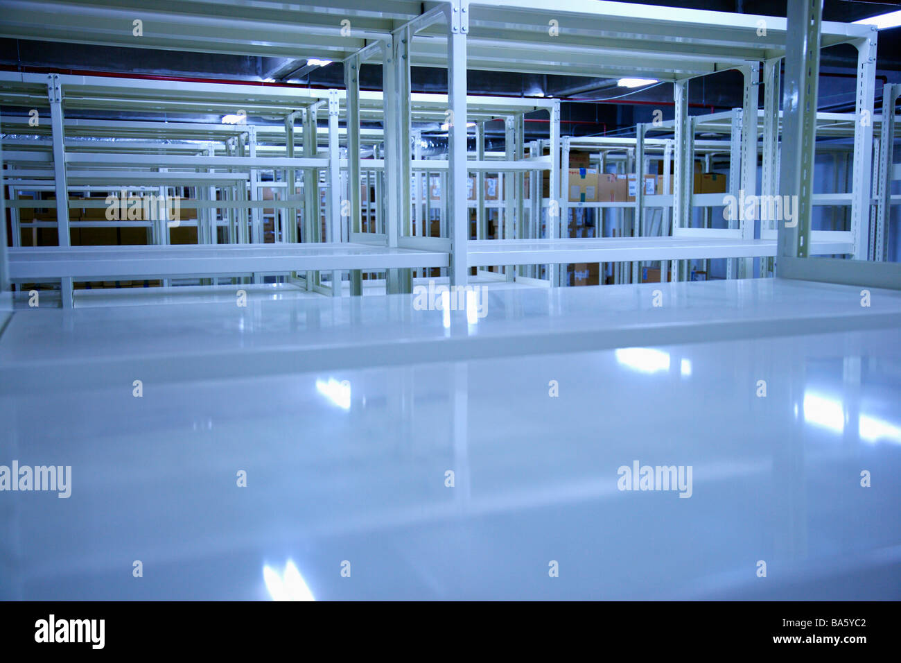 Warehouse with empty shelves Stock Photo - Alamy