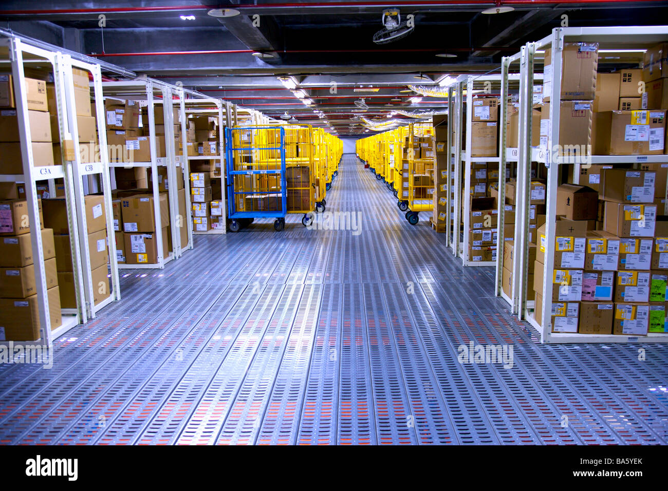 Warehouse shelves stacked with boxes Stock Photo - Alamy