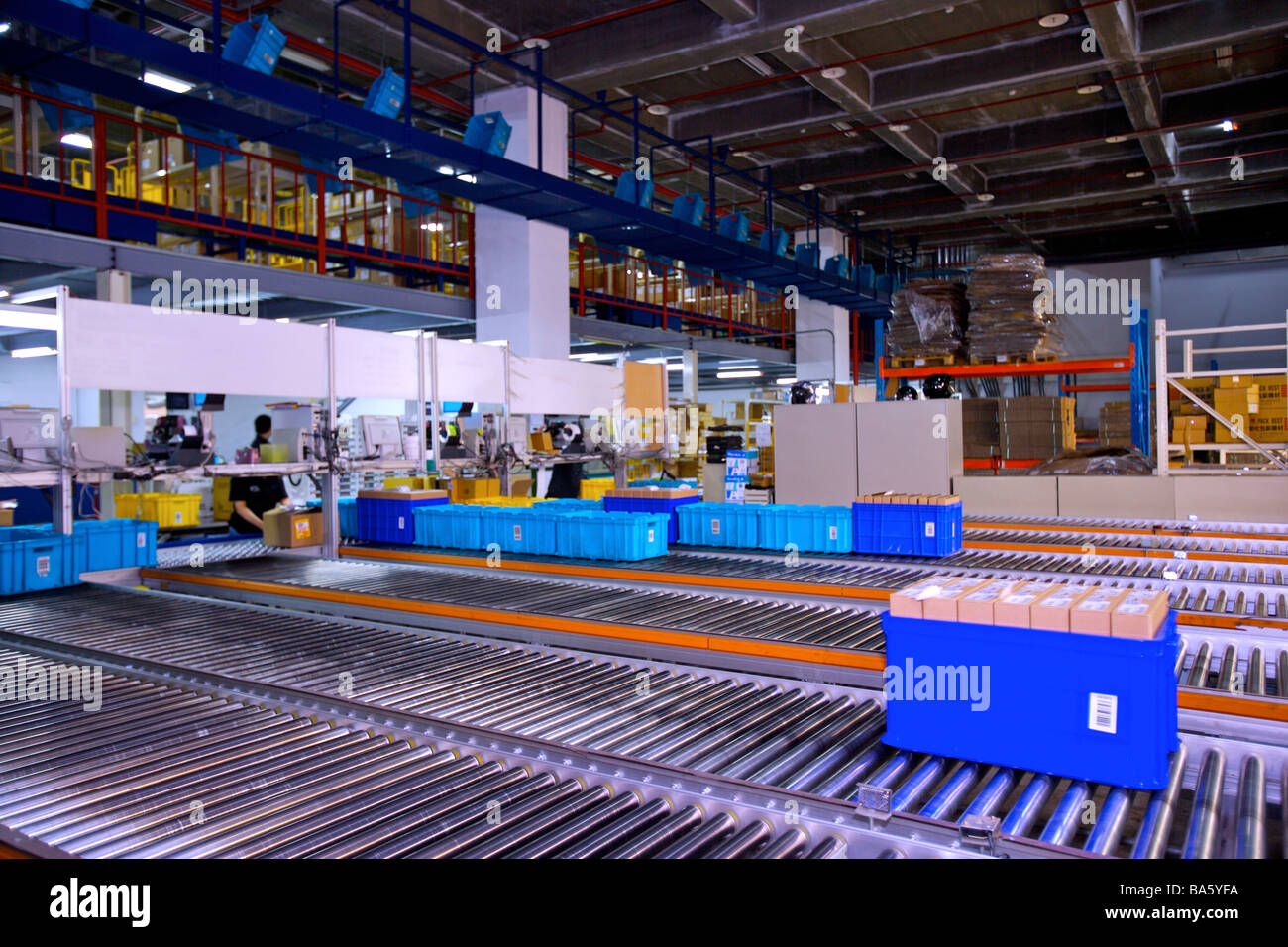 Boxes on conveyor belt Stock Photo - Alamy