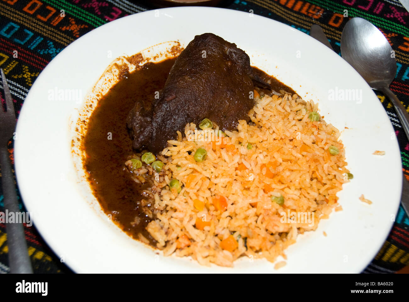 Mexican cuisine, meat in chocolate sauce Stock Photo - Alamy