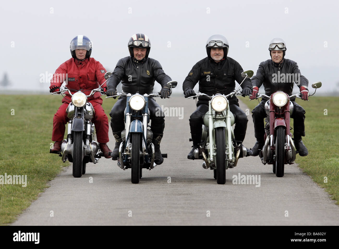 Motorcyclists Oldtimer-Motorräder group tour track no property release ...