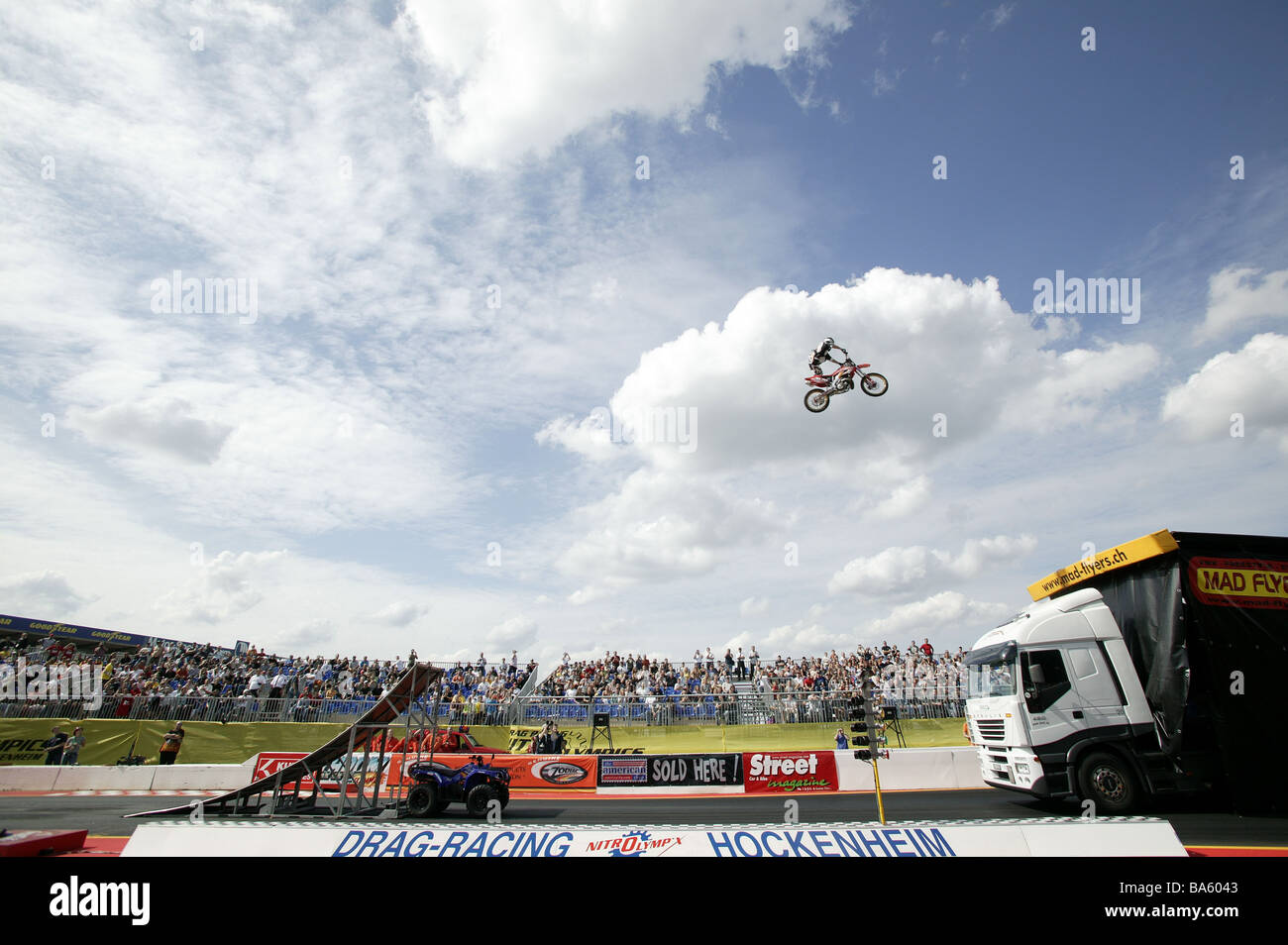 Motorcyclists Freestyle Motocross jump ramp Truck spectators no ...
