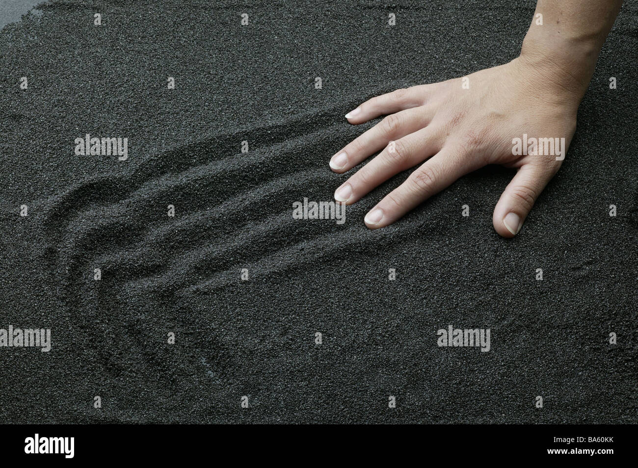 Hand sand fingers patterns tracks woman sand-grains black movement line ...