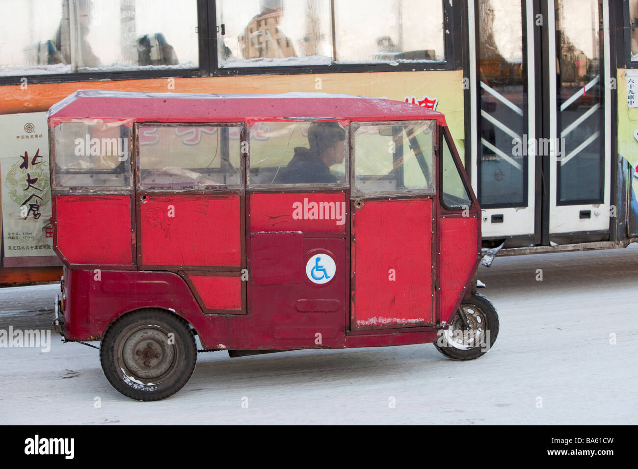 A disabled three wheeler in Harbin in China Stock Photo - Alamy