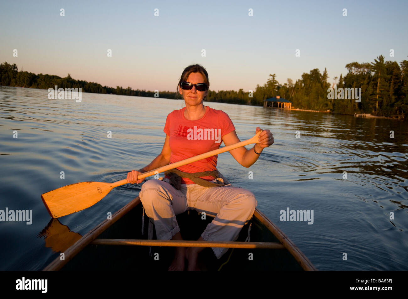 Young woman woods canoe hi-res stock photography and images - Alamy