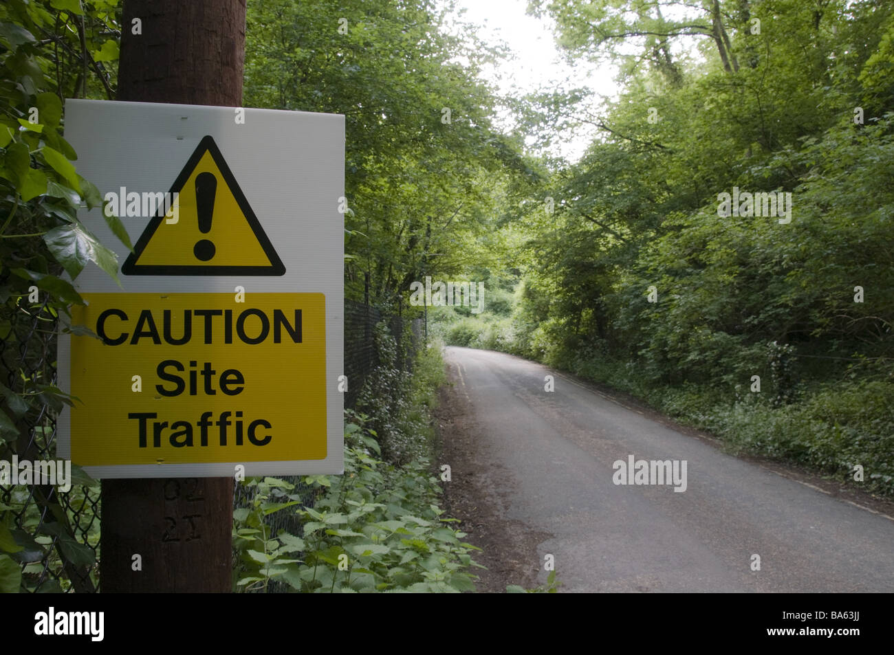 A warning sign on a country road Stock Photo - Alamy