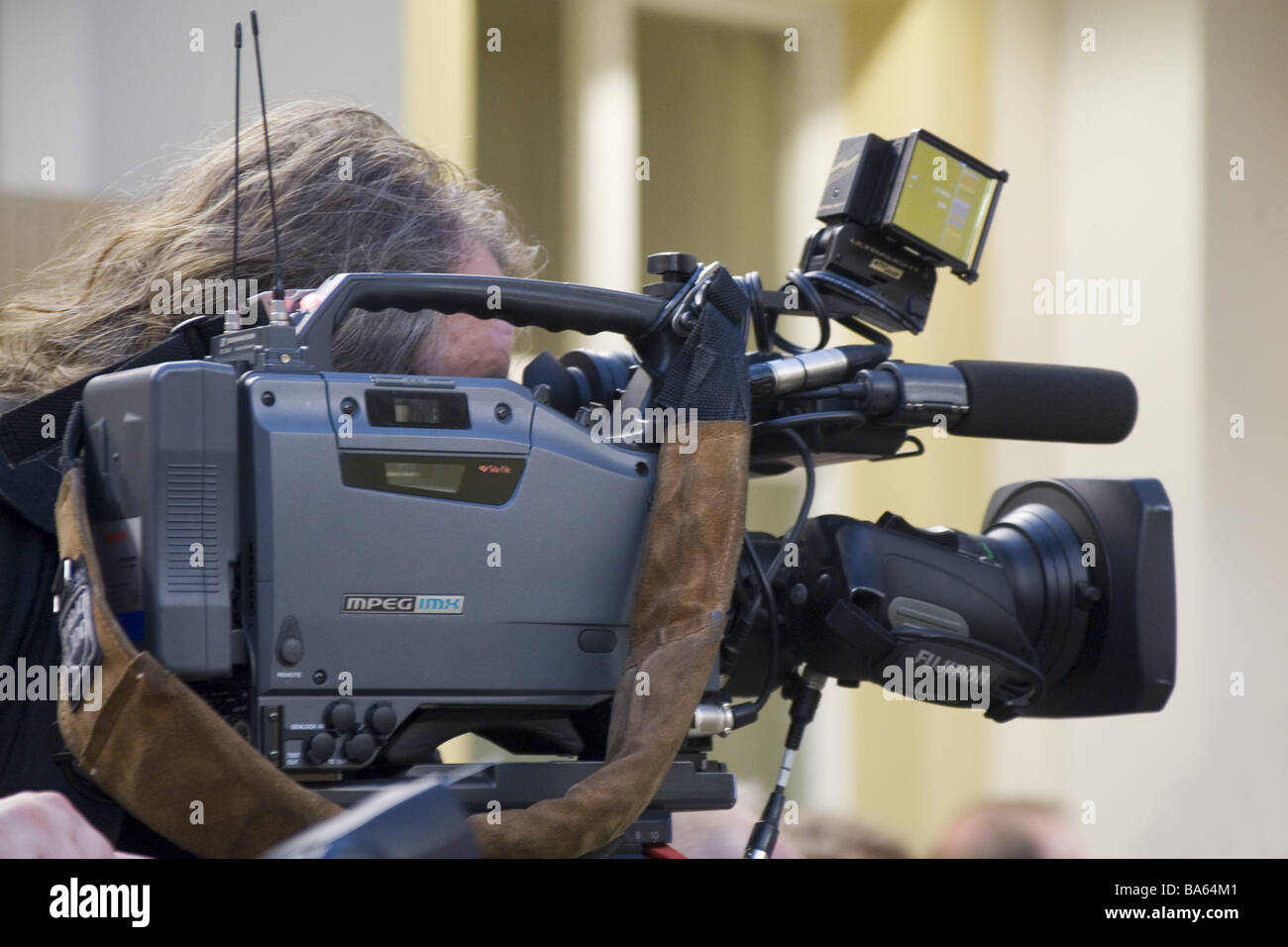 Television-production cameraman detail people man television camera ...