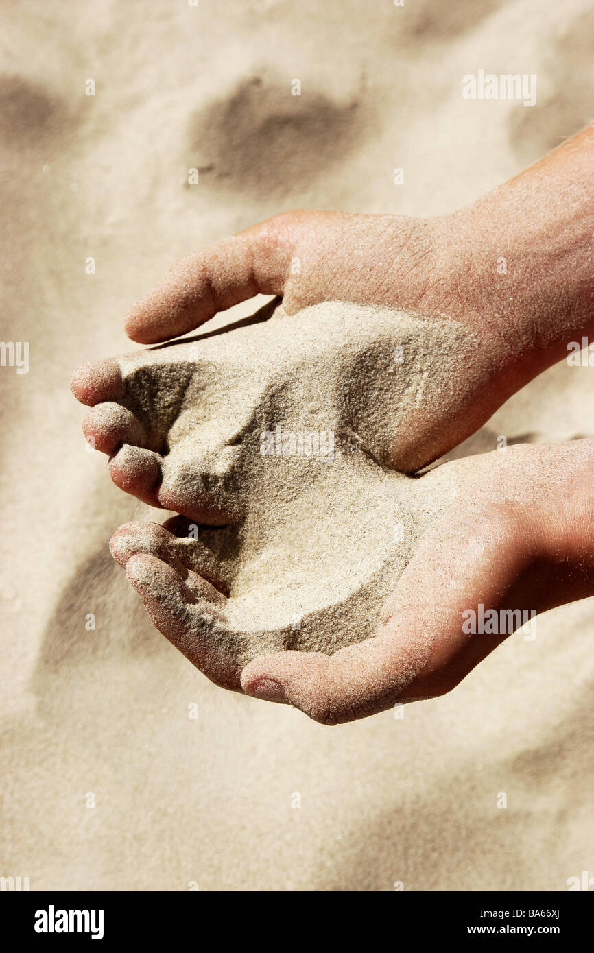 Hands sand hold beach sandy beach feels feels senses plays sense of ...
