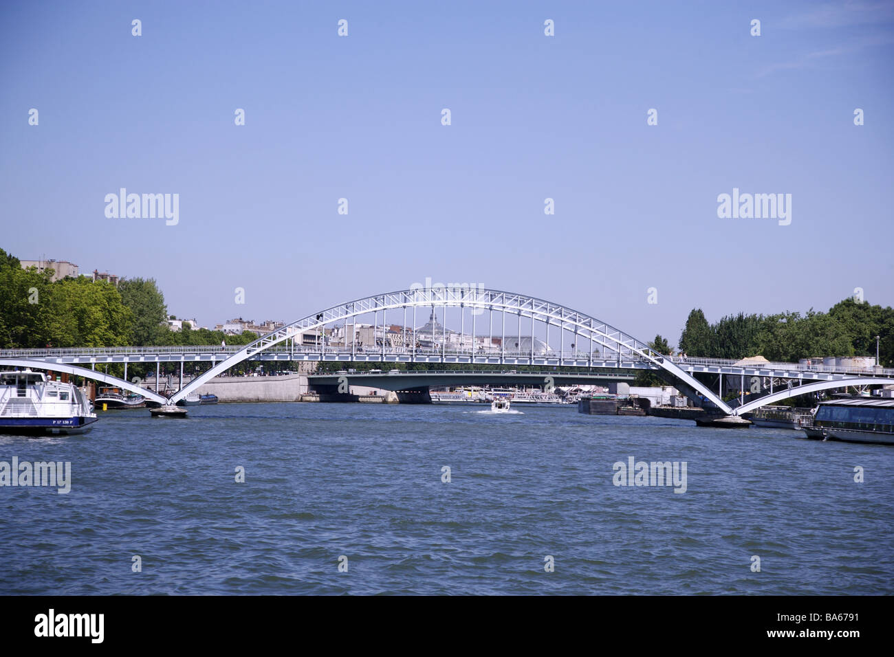 Arch bridge above Seine River Paris Stock Photo - Alamy