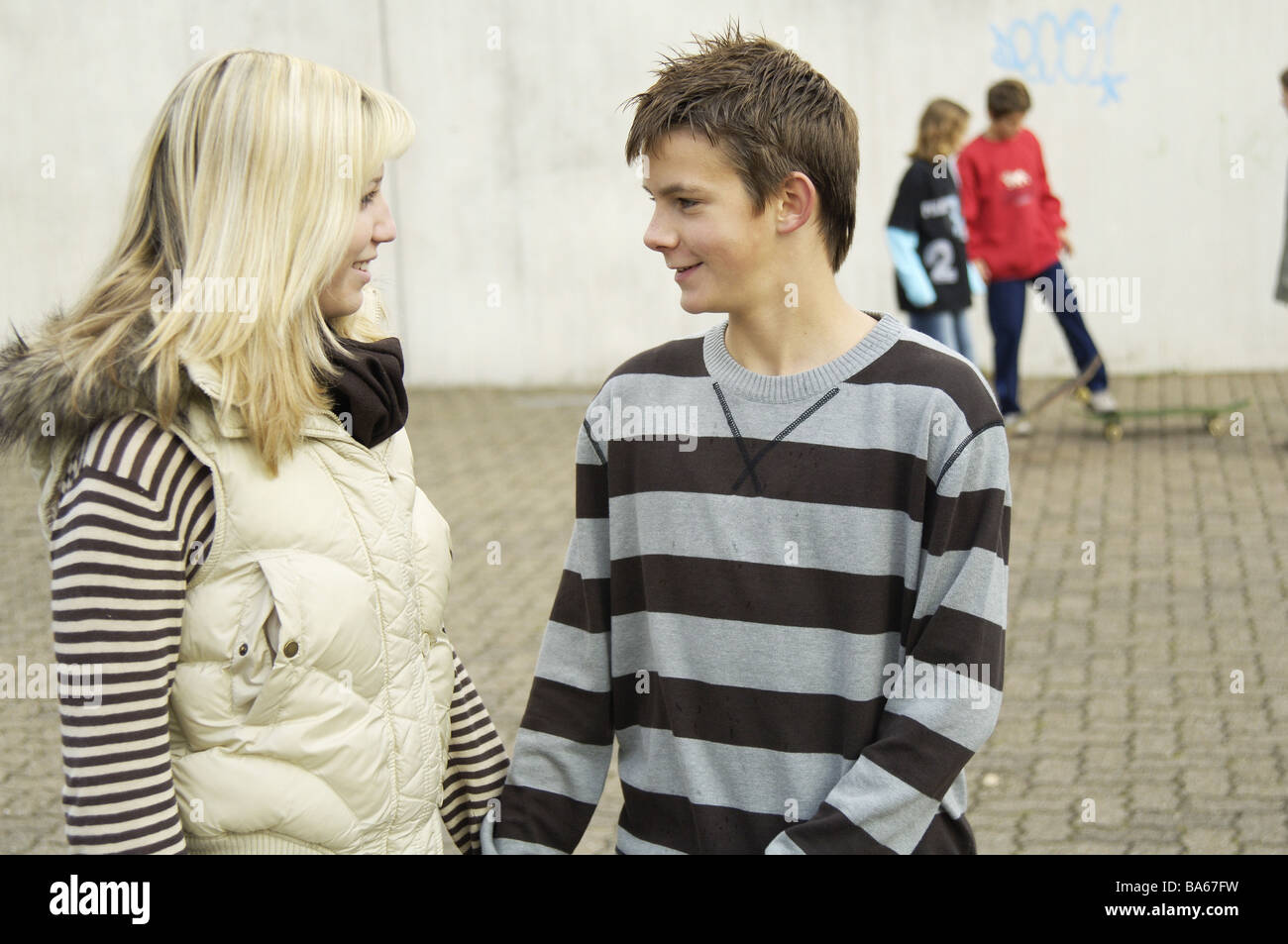 Teenager pair hand in hand falls in love gaze-contact series people ...
