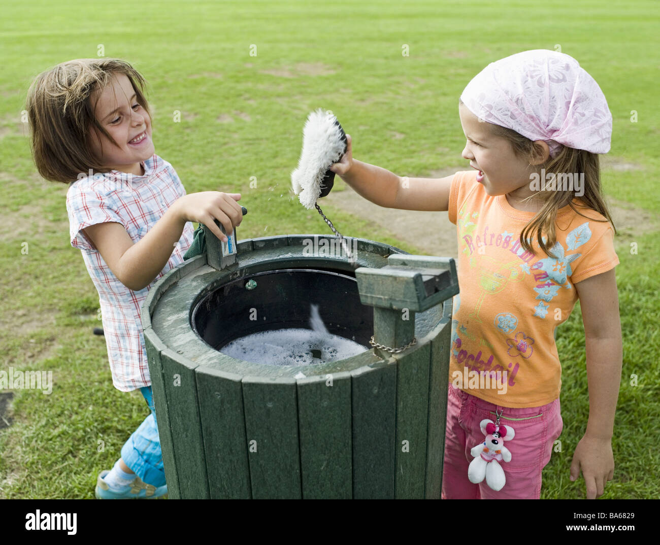 Water trough children hi-res stock photography and images - Alamy