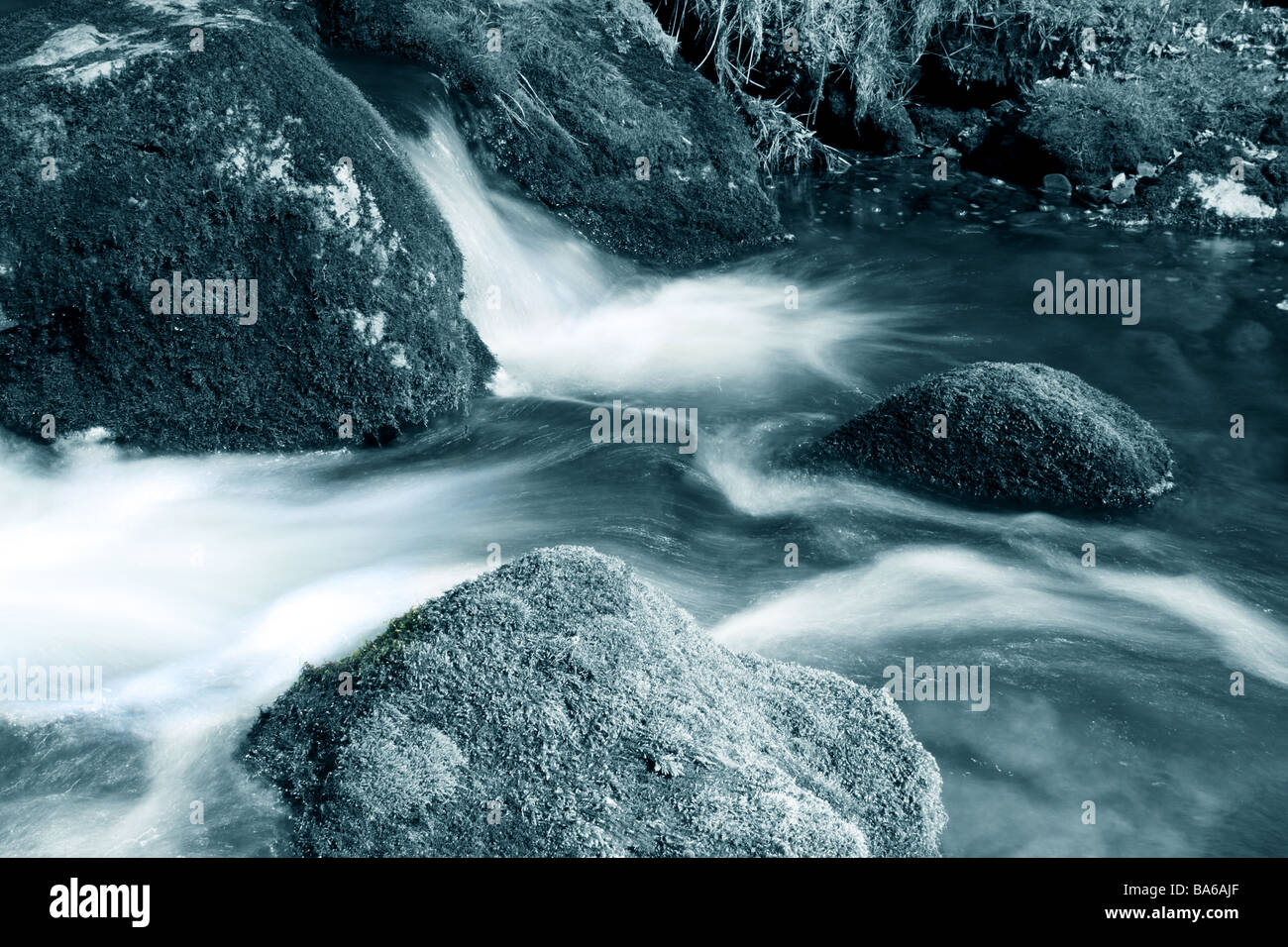 flow of water over rocks Stock Photo - Alamy