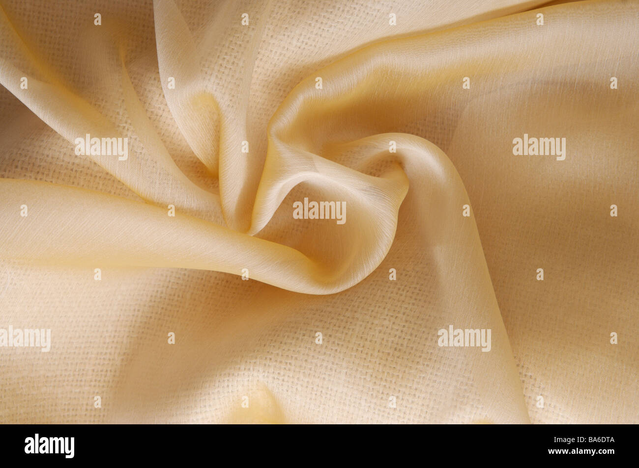 Sheer yellow fabric Stock Photo - Alamy