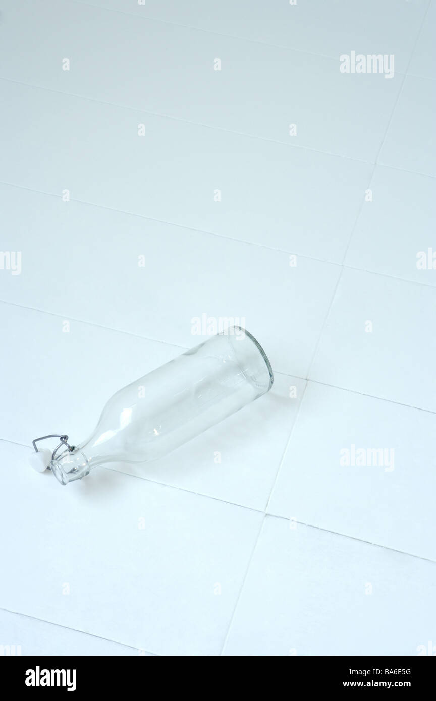 An empty glass bottle Stock Photo - Alamy