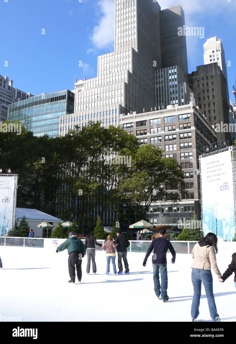 USA New York city Rockefeller Center Lower Plaza ice-surface skaters ...