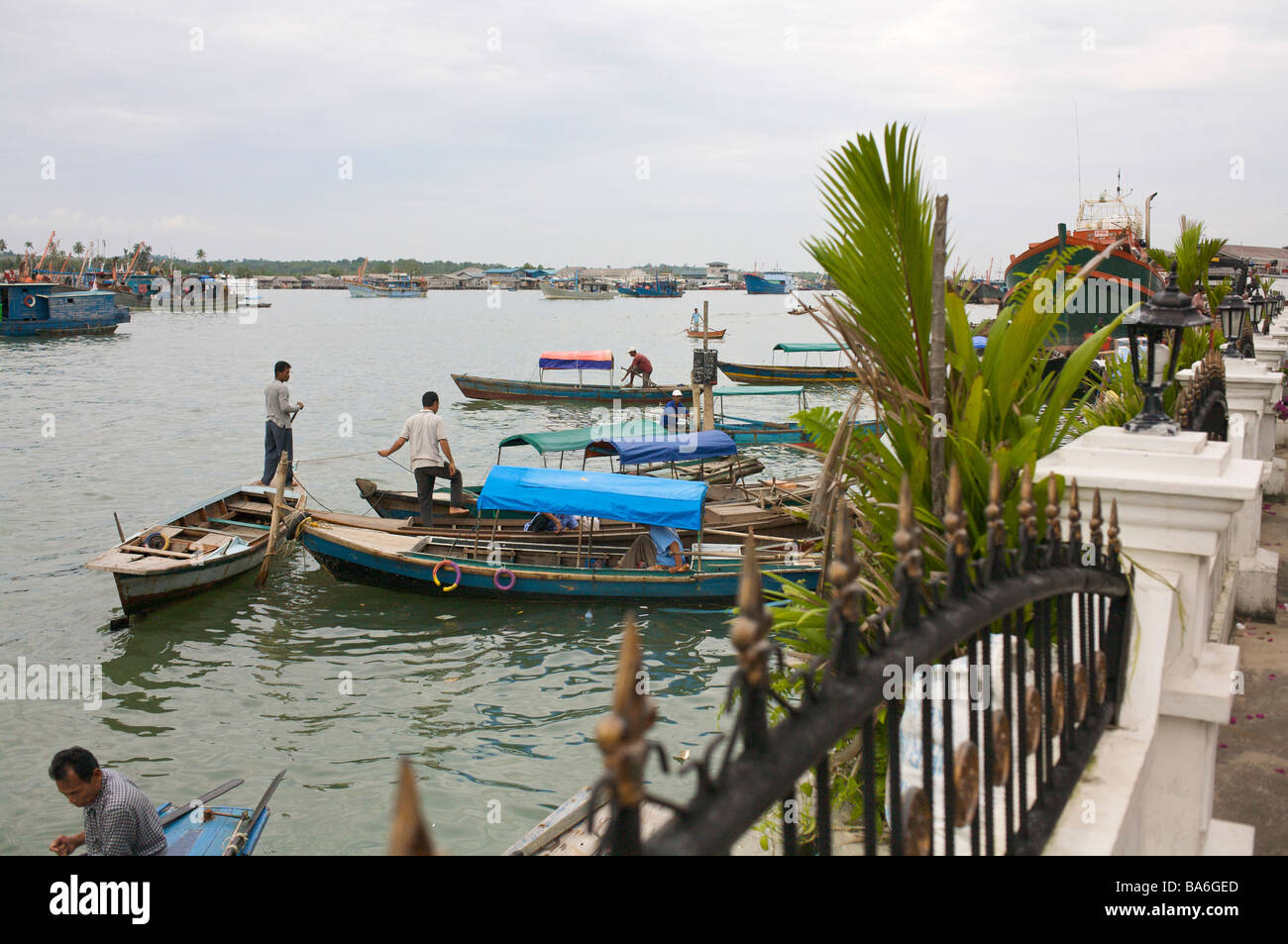 Boats on harbour in Indonesia Stock Photo - Alamy