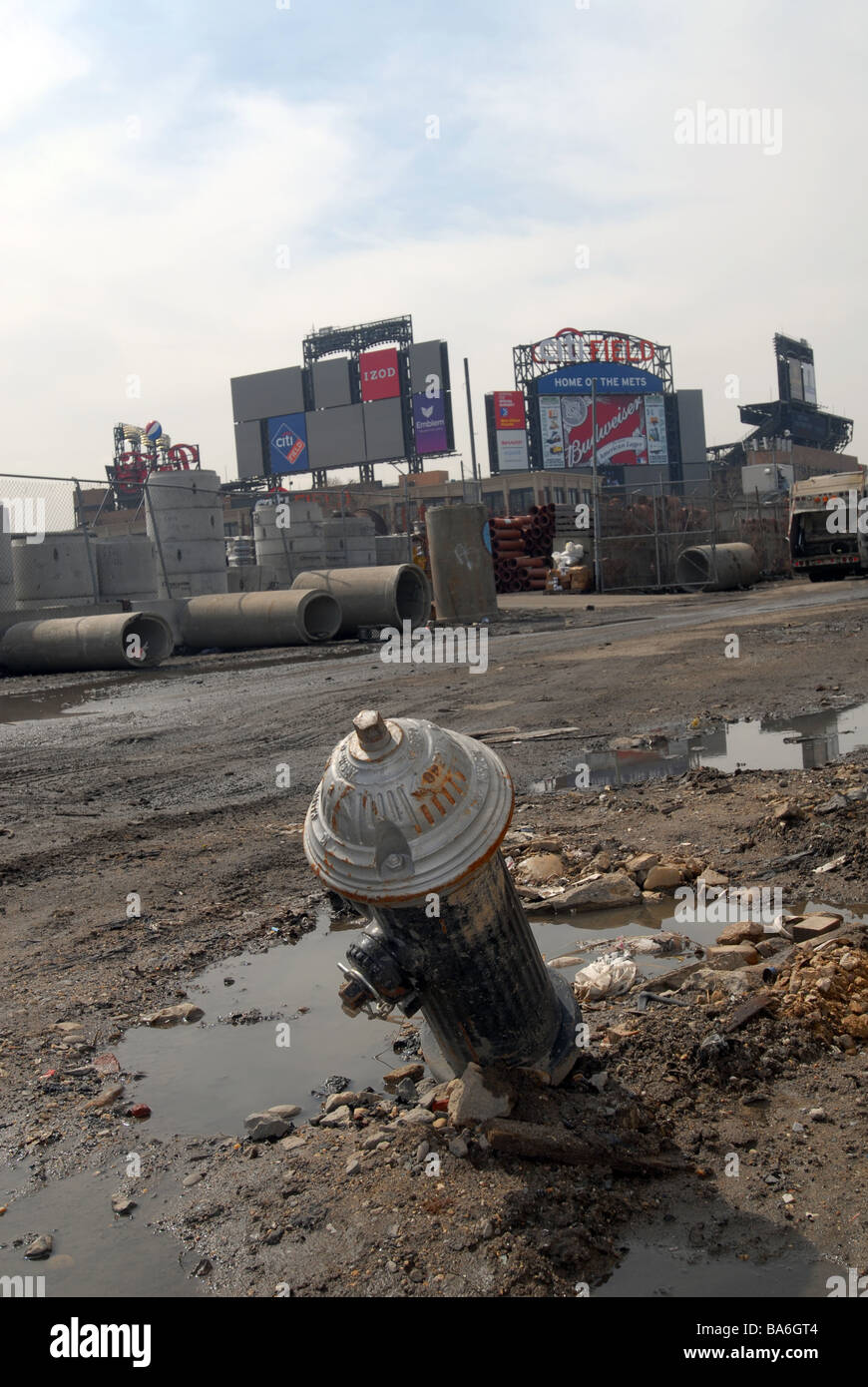 A damaged fire hydrant on a street in the Willetts Point neighborhood ...