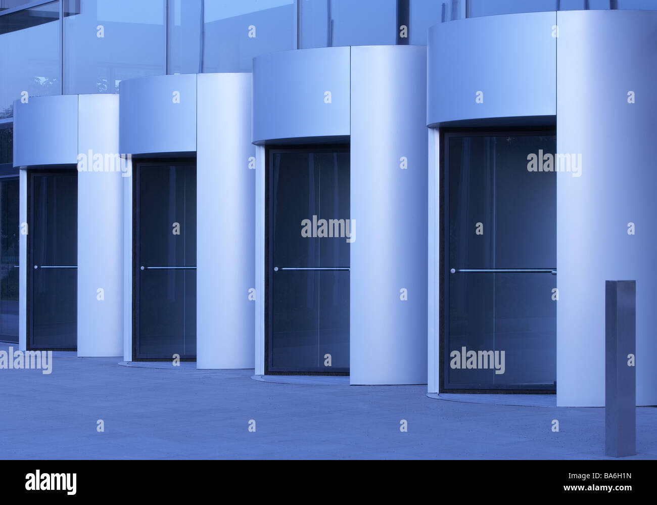 Germany Bavaria Munich fair-buildings detail entrance revolving doors ...