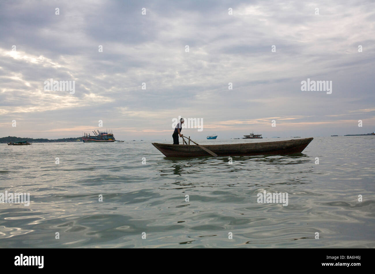 Boats on harbour in Indonesia Stock Photo - Alamy
