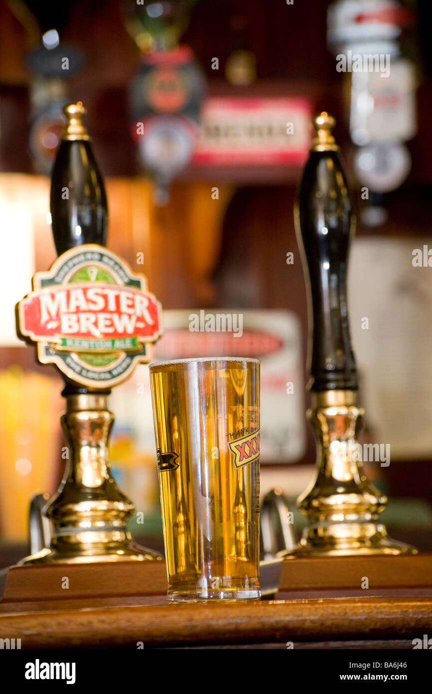 Pint of lager on a pub bar in an English public house Stock Photo - Alamy